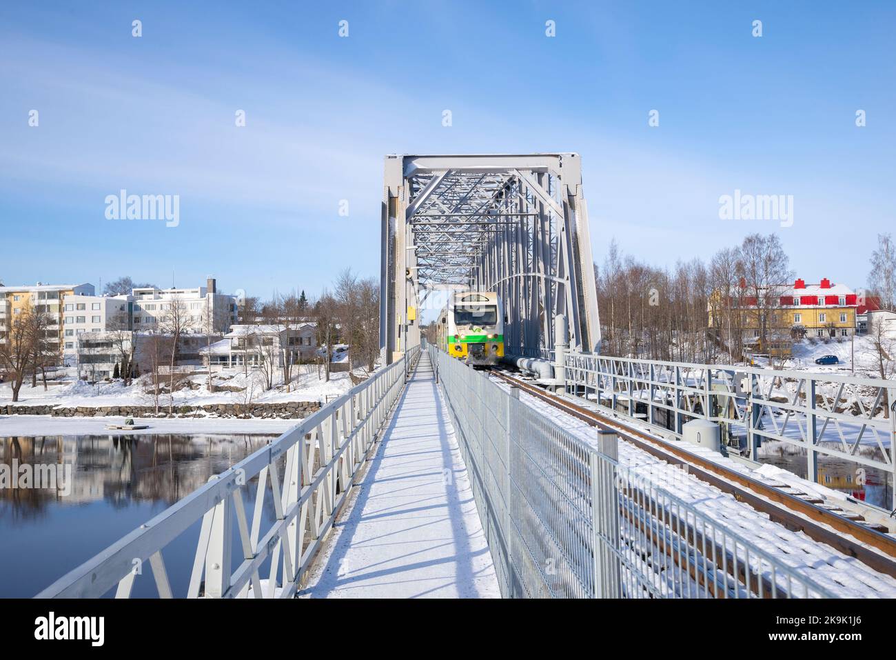 SAVONLINNA, FINLAND - MARCH 03, 2018: Railway bridge with passing ...