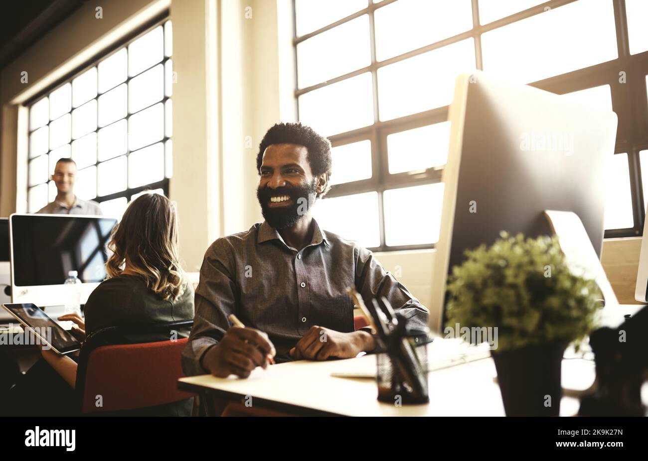 Im ready to impress the boss. a handsome businessman sitting at his ...