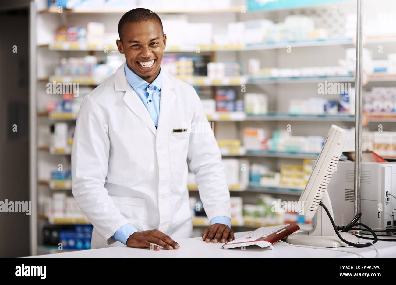 Portrait handsome young pharmacist chemist hi-res stock photography and ...