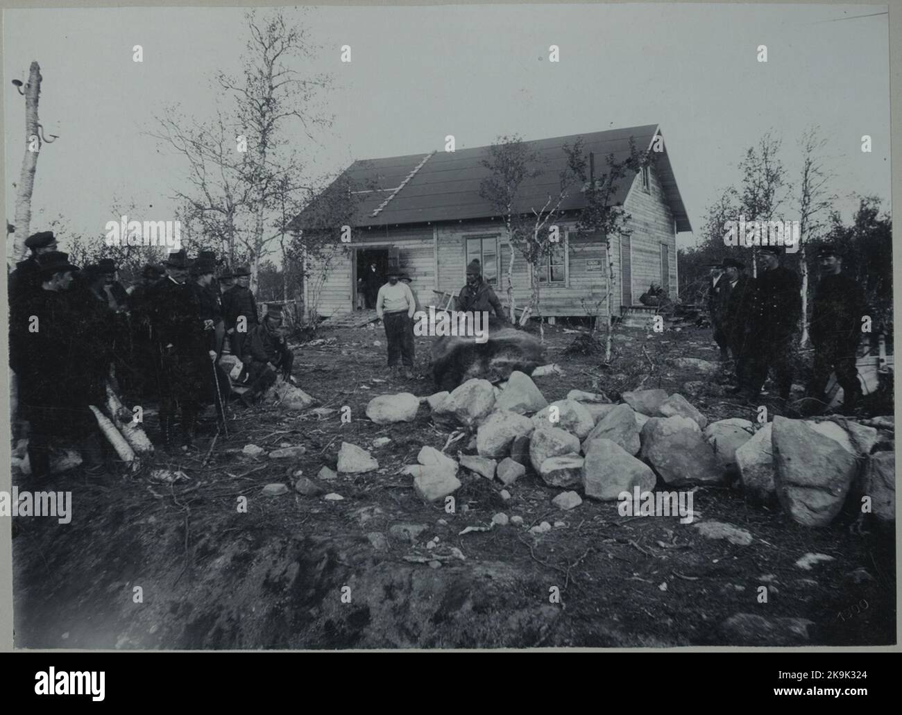 Sami offered to buy a bear skin Stock Photo - Alamy