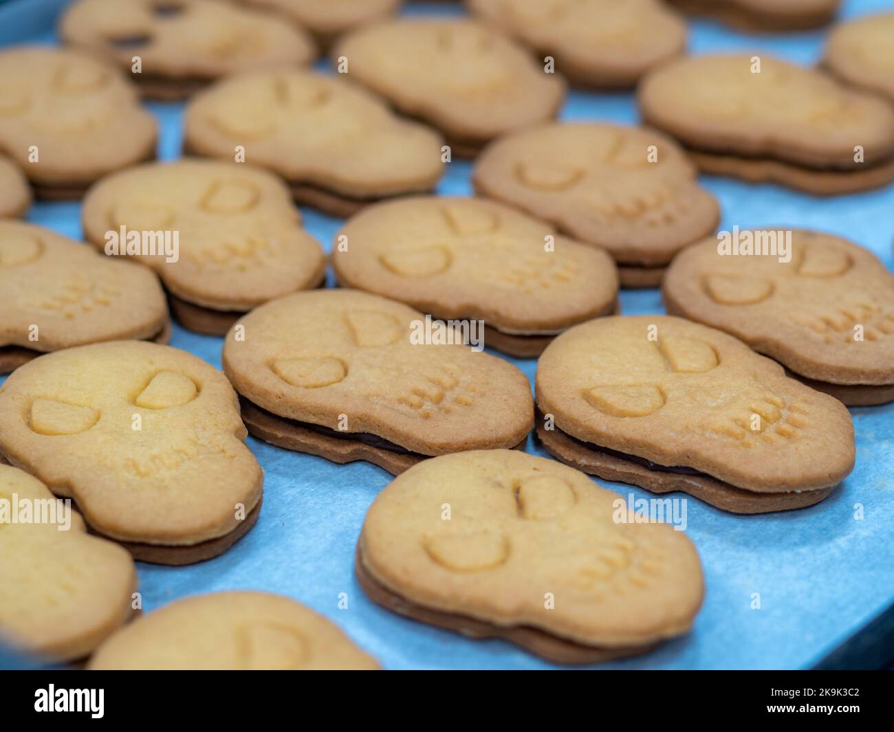 preparing sweet yellow cookies in the bakery Stock Photo - Alamy