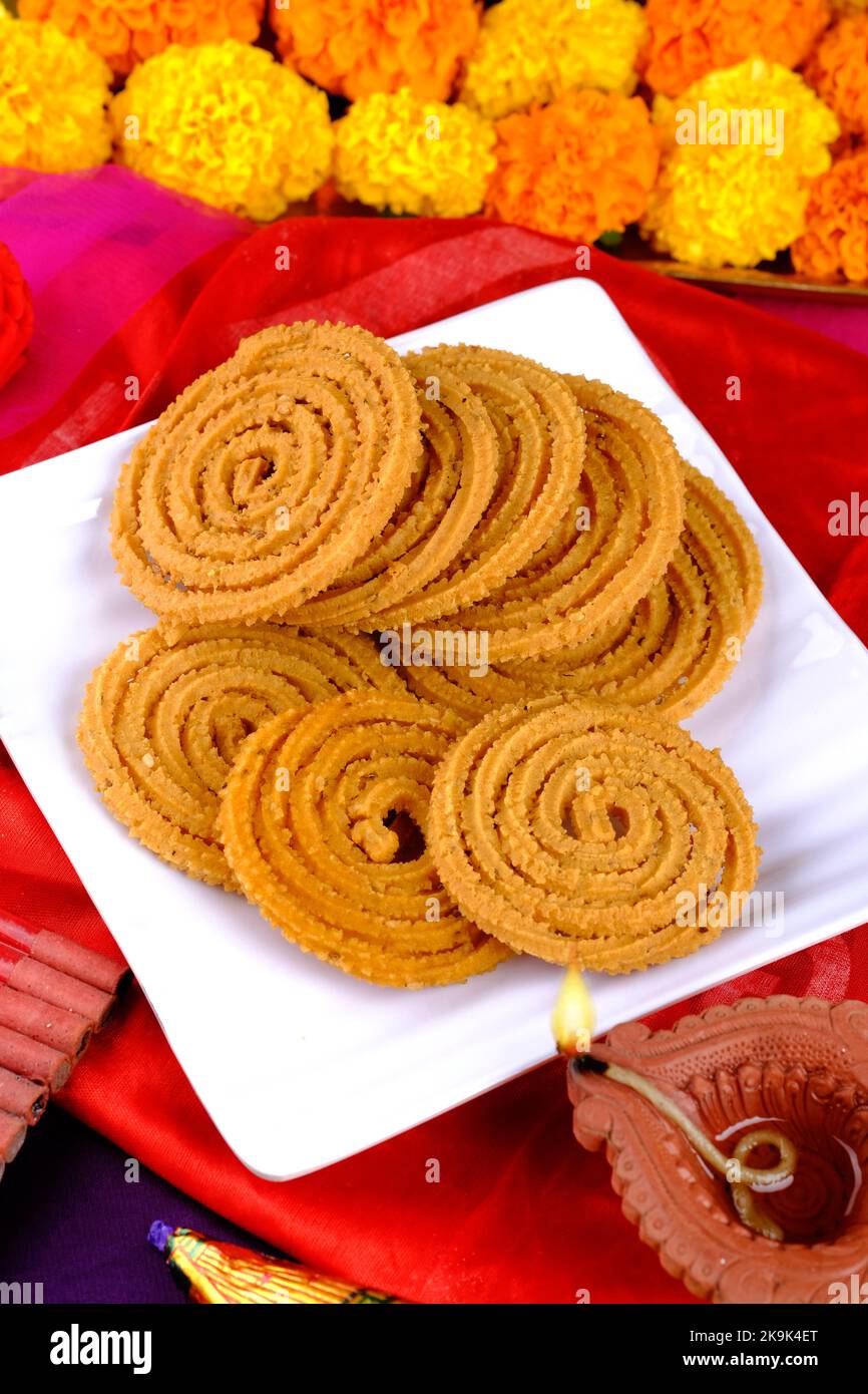Indian Traditional Snack Chakli, a spiral shaped, Chakali or murukku ...