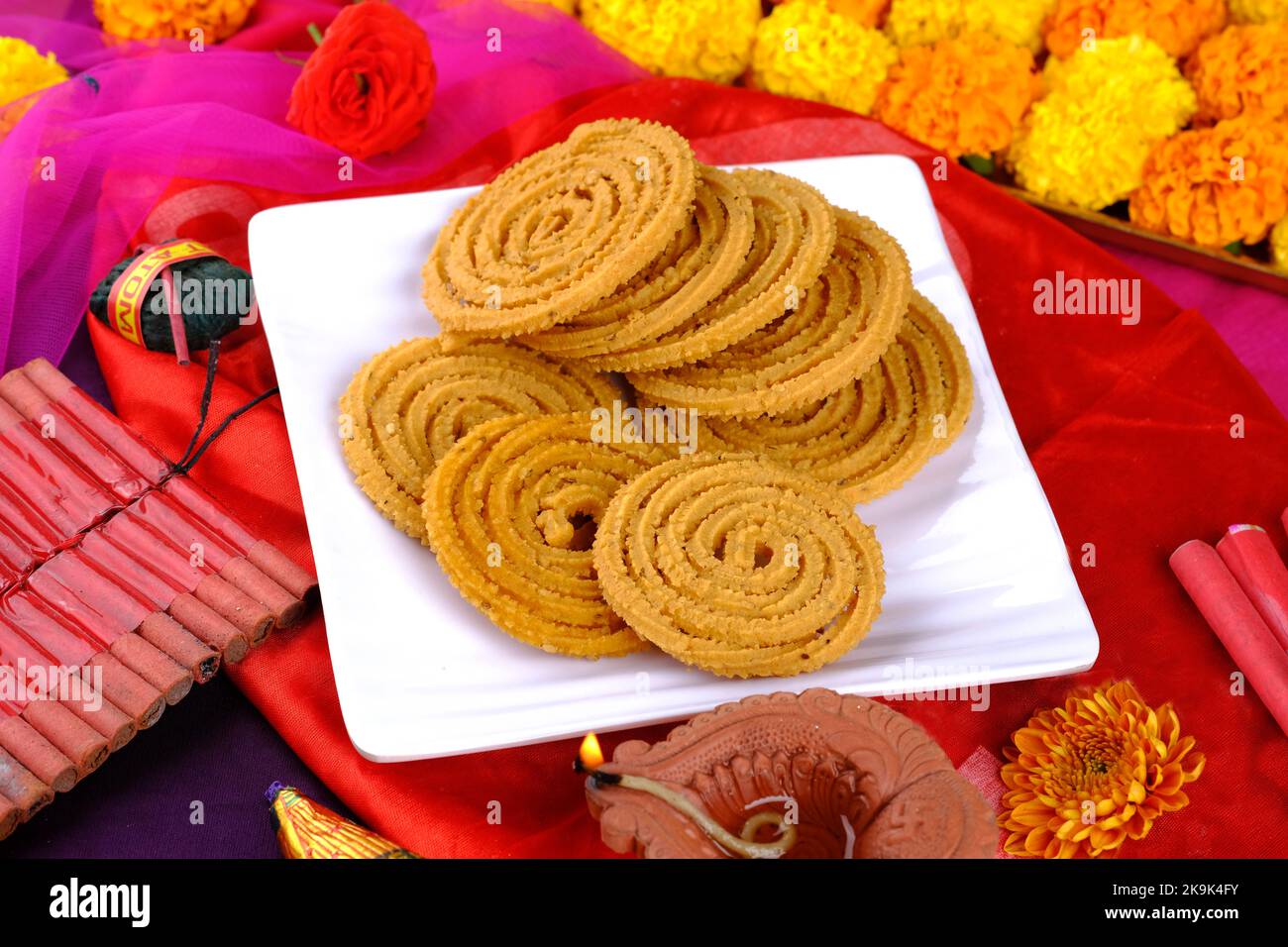 Indian Traditional Snack Chakli, a spiral shaped, Chakali or murukku ...