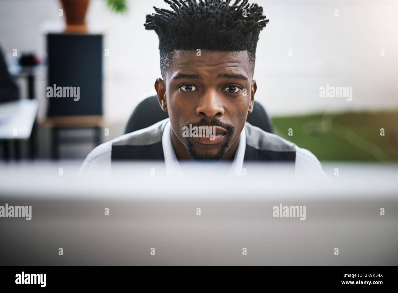 Businessman sitting desk looking straight hi-res stock photography and ...