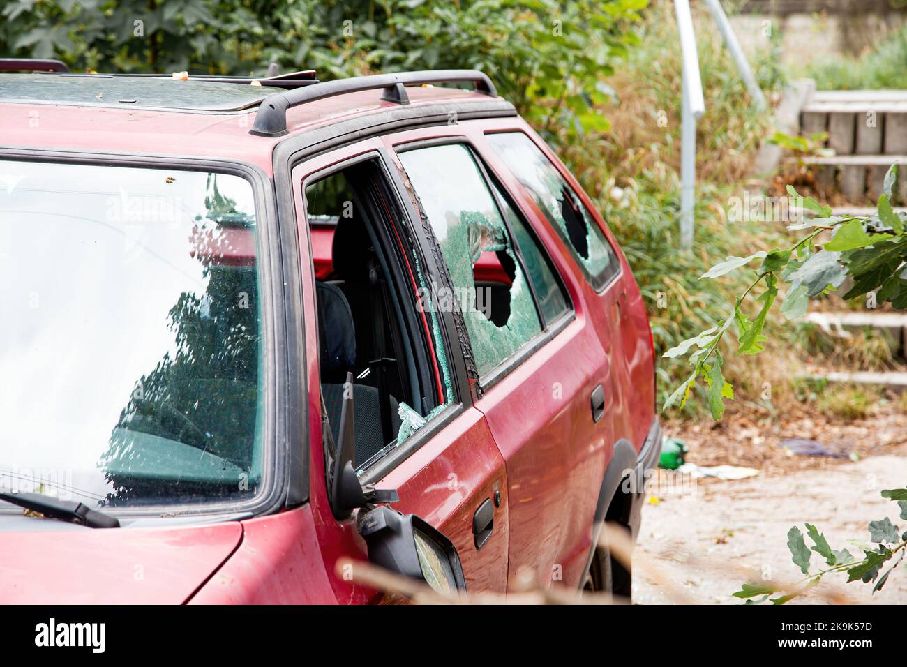 Car with broken windows. A criminal incident. Broken glass window car ...