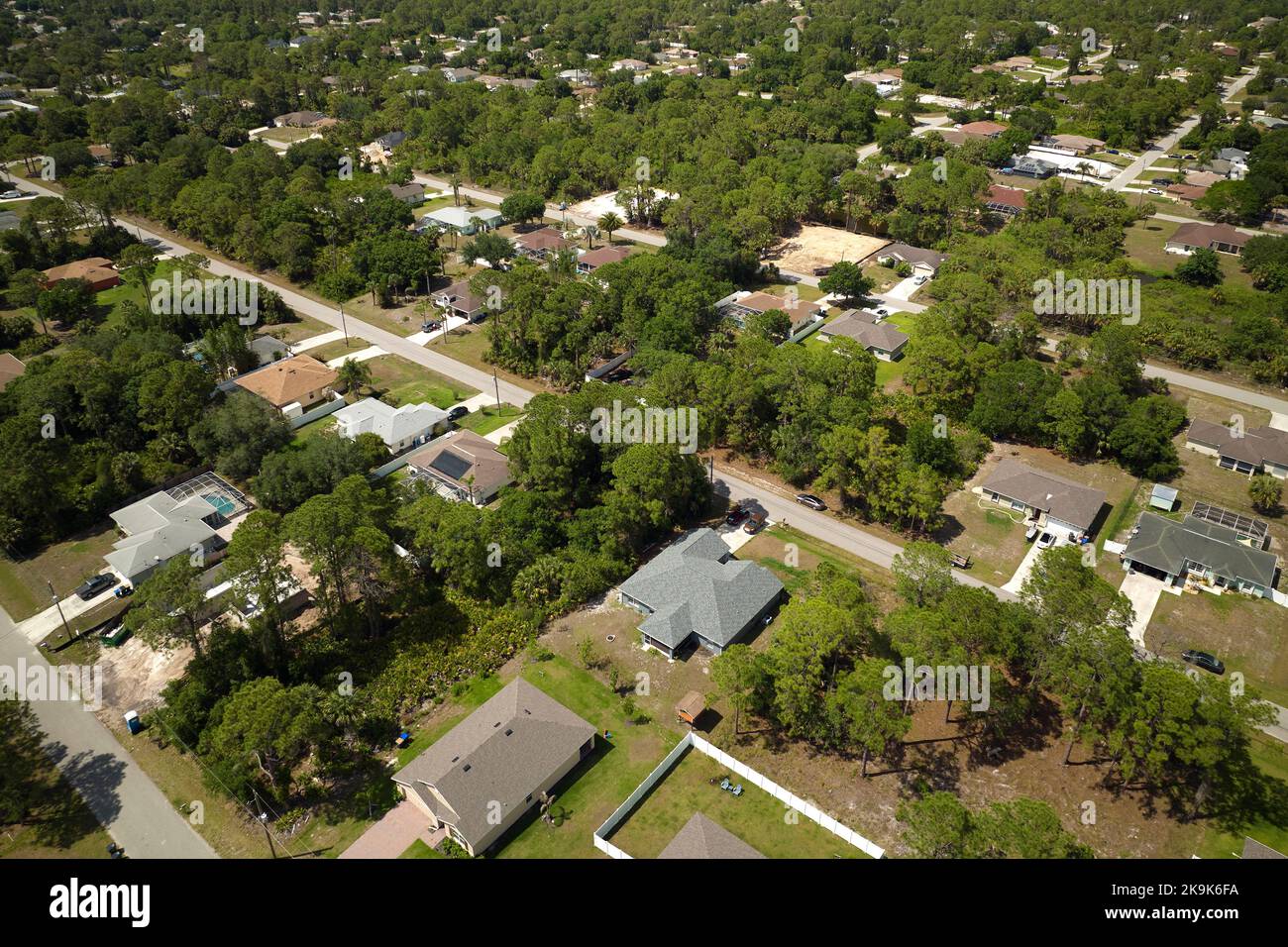 Aerial view of small town America suburban landscape with private homes ...