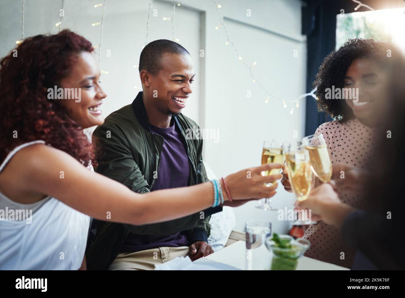 Make time for fun times. a group of young friends enjoying a night out ...