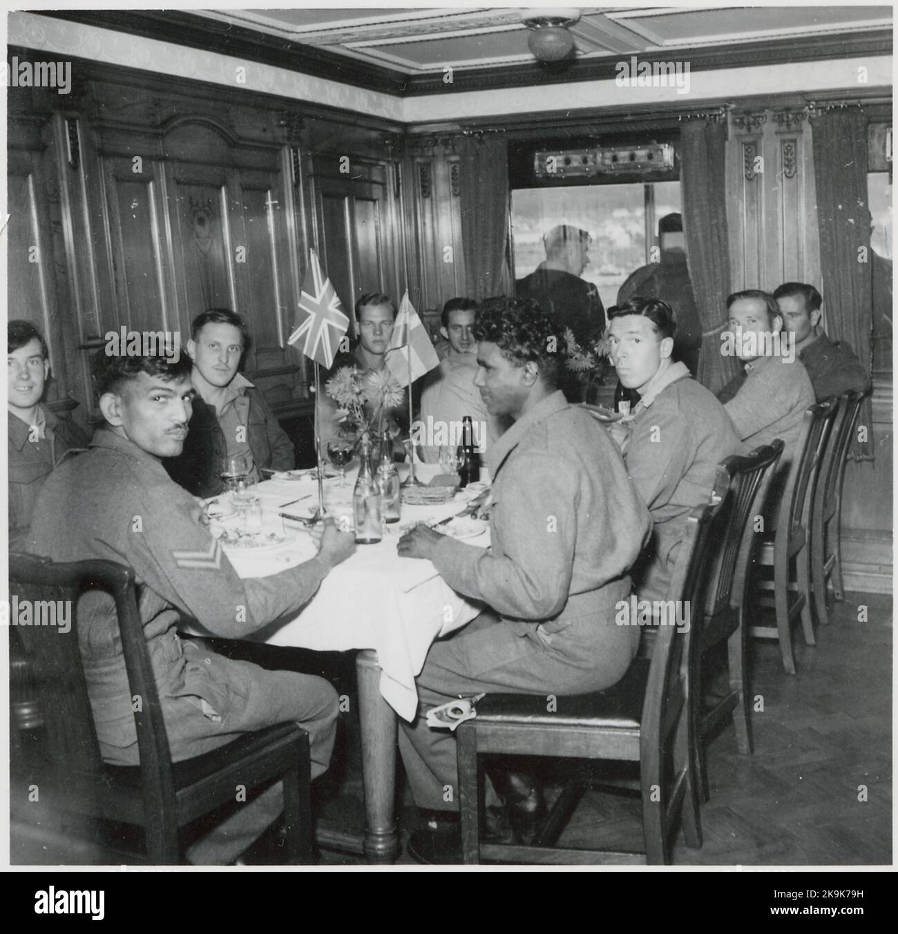 English prisoners of war are served breakfast aboard Queen Victoria ...
