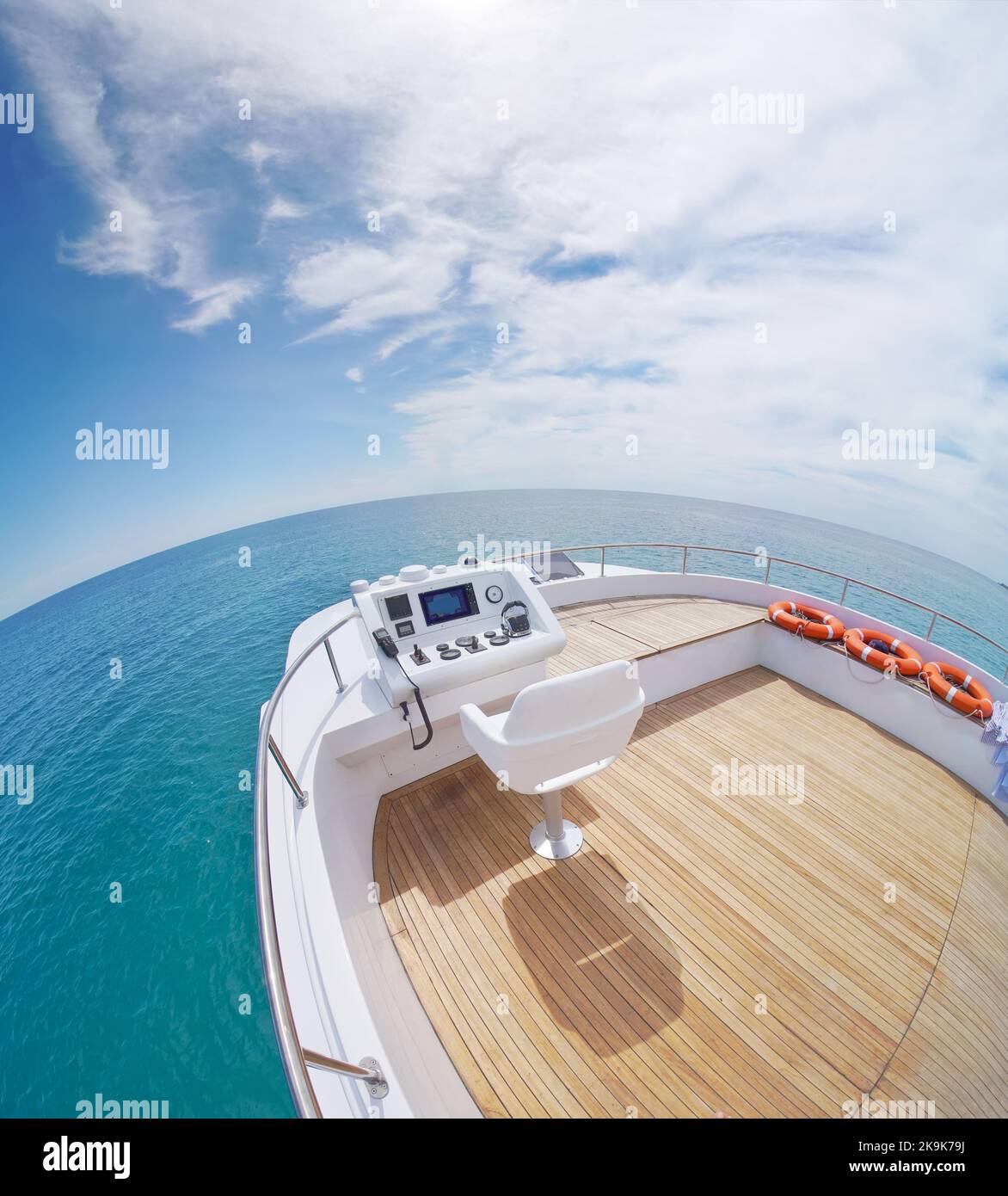 View from yacht flybridge open deck on the calm sea water at day ...