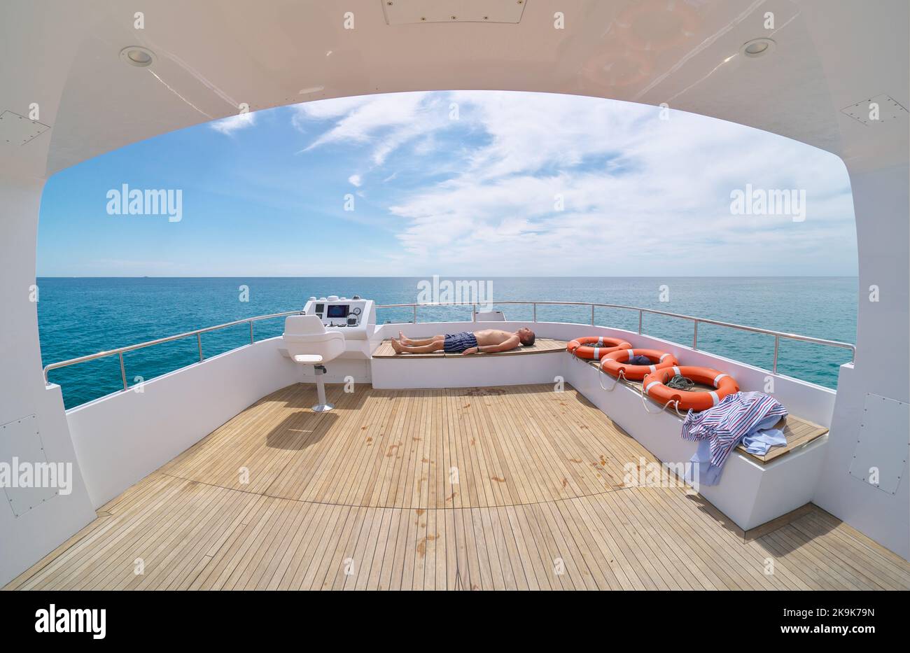 Man relax on yacht. Pleasure recreation at sea. View from yacht ...
