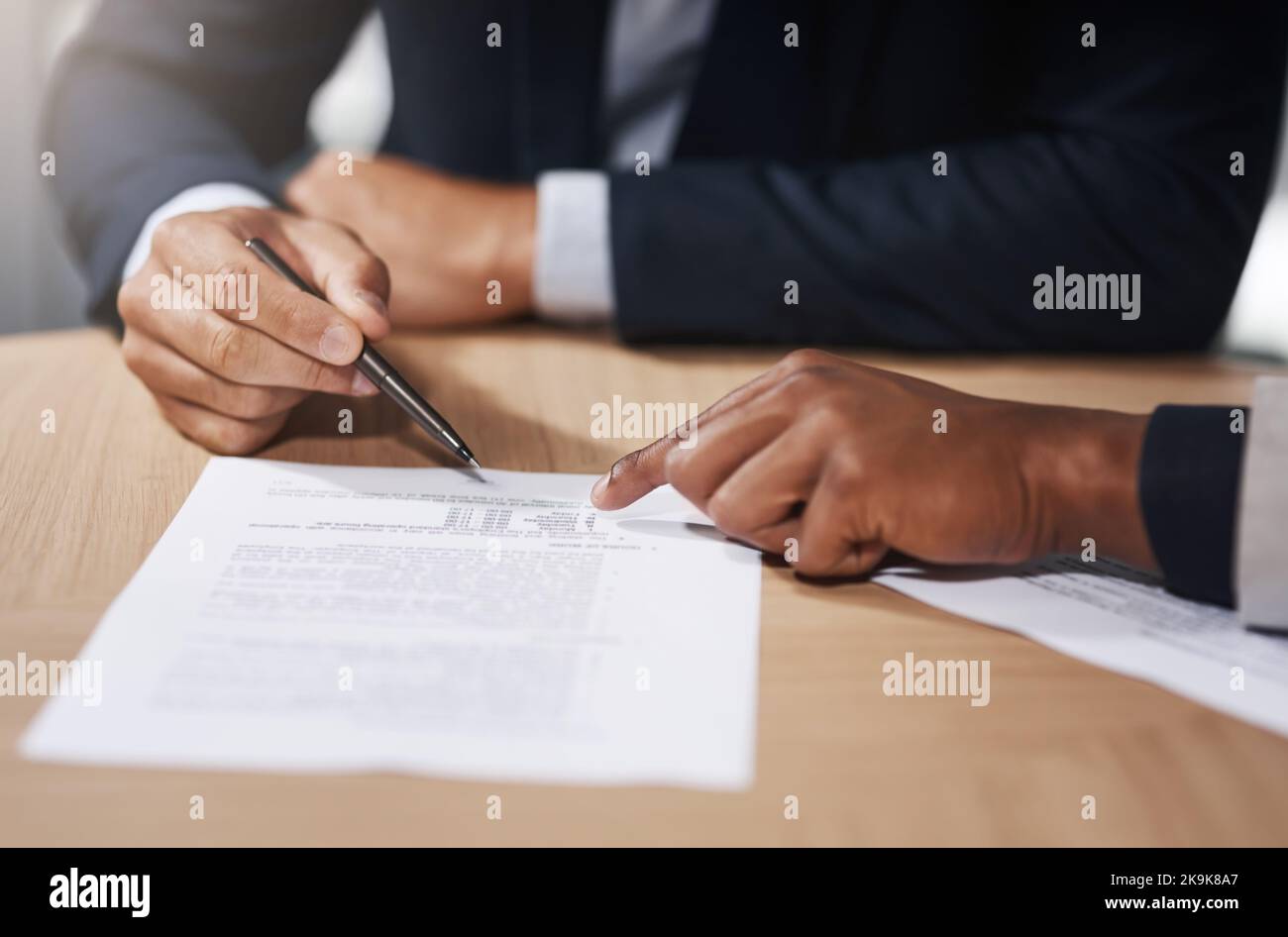 This documentation requires both of their attention. Closeup shot of ...