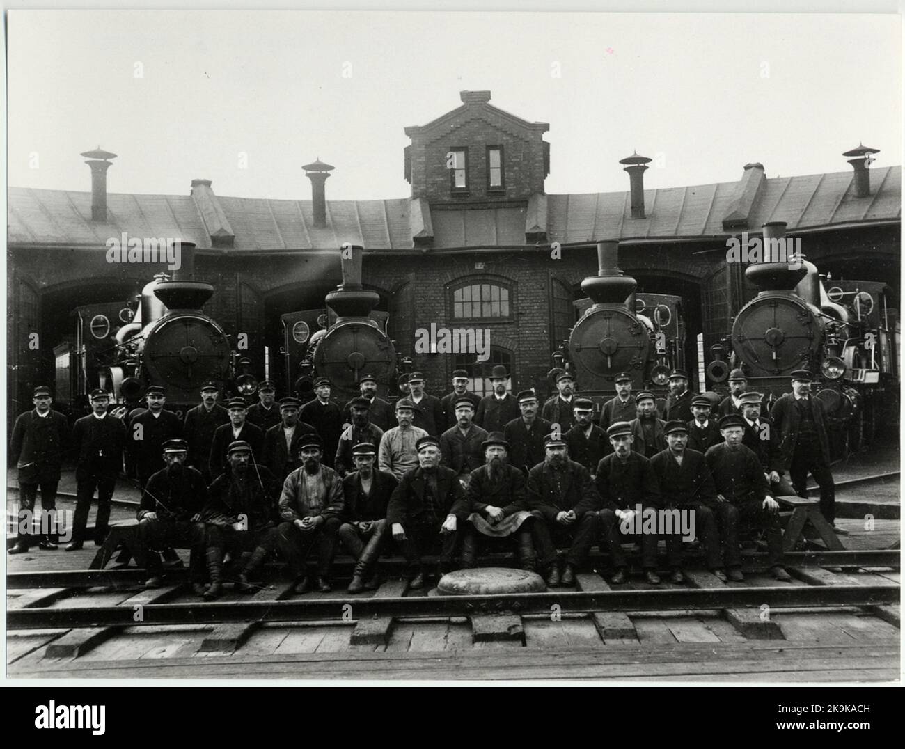 Katrineholm's locomotive station about 1895. The staff poses in front ...