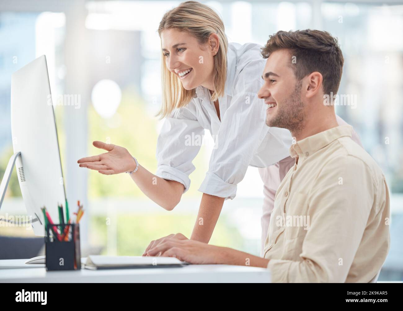 Teamwork, training and human resources with a business woman helping a ...