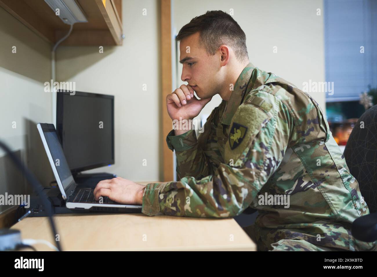 Education, the most powerful tool there is. a young soldier using a ...