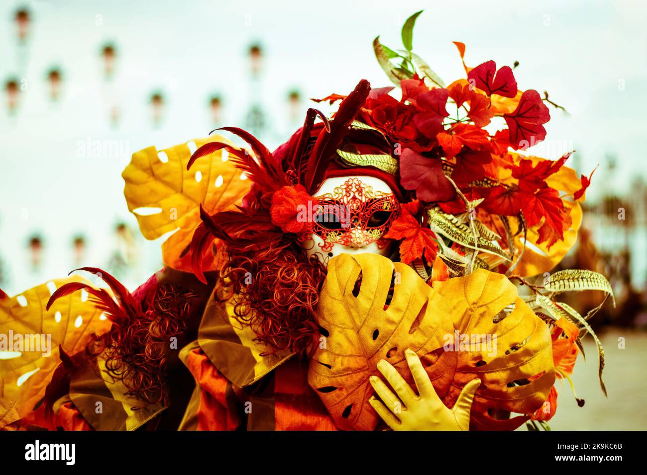 the colors of autumn on the costume of the carnival Stock Photo - Alamy