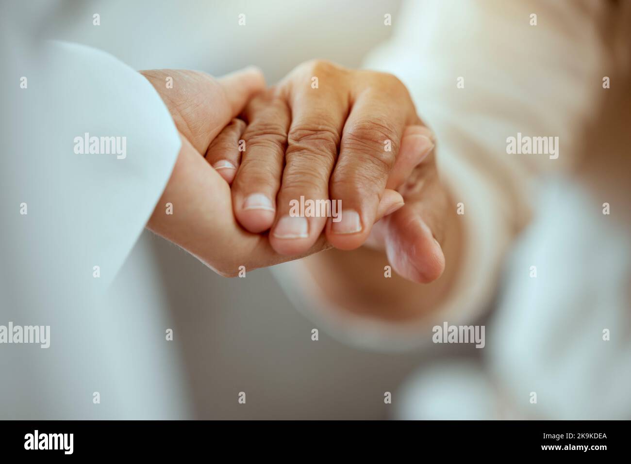 Elderly support with family, people holding hands praying together in ...
