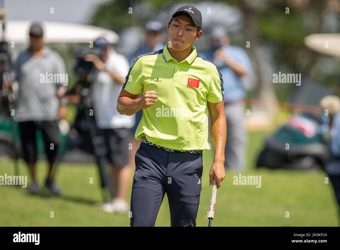 CHONBURI, THAILAND - OCTOBER 29: Bo Jin of China makes a fist pump ...