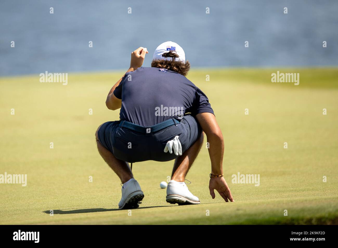 CHONBURI, THAILAND - OCTOBER 29: Harrison Crowe of Australia checks his ...