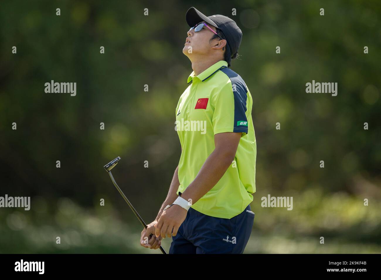 CHONBURI, THAILAND - OCTOBER 29: Ziqin Zhou of China on hole 16 during ...