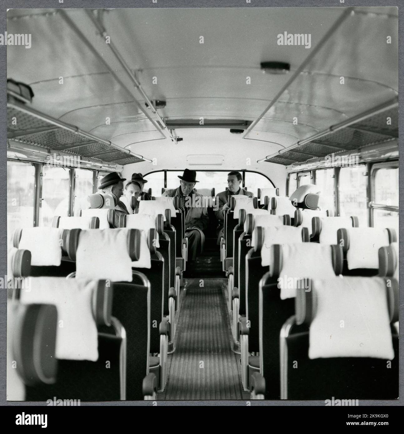 Travelers aboard bus Stock Photo - Alamy