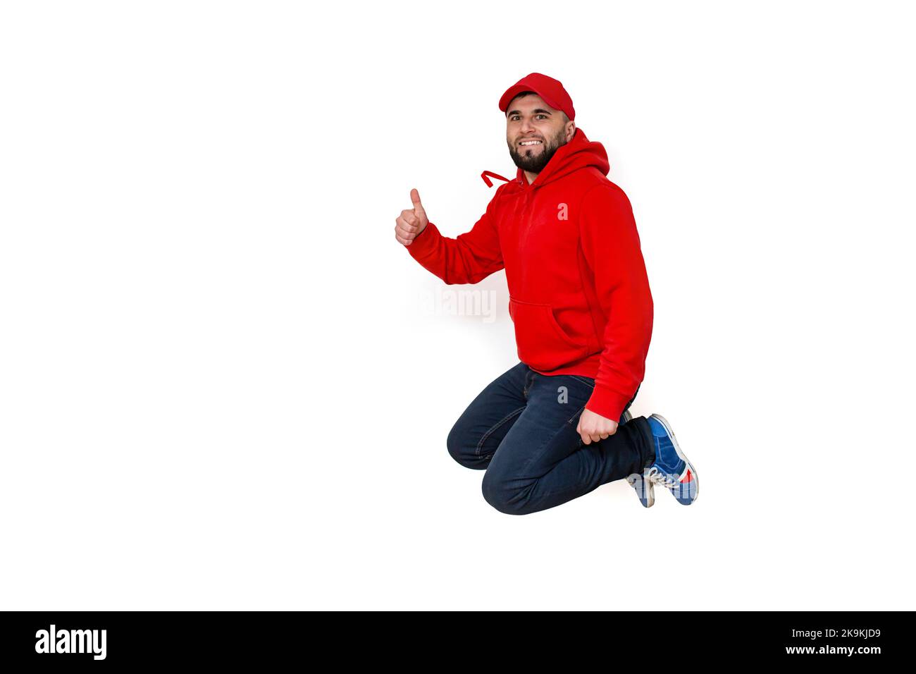 Happy Caucasian Bearded Man Smilying And Jumping In The Air Showing
