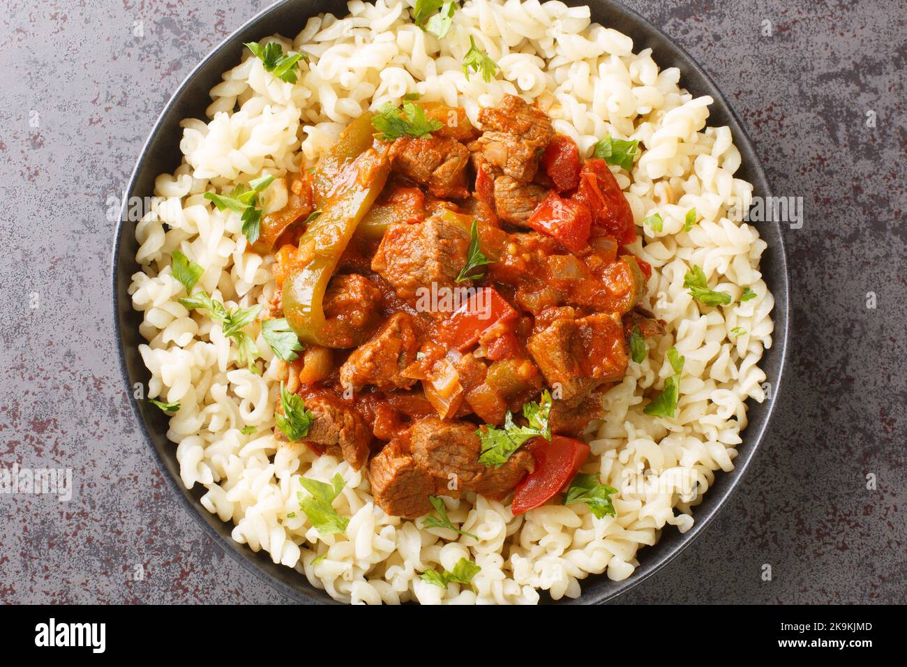 Porkolt is Hungarian for beef stew made by braising meat and simmering ...
