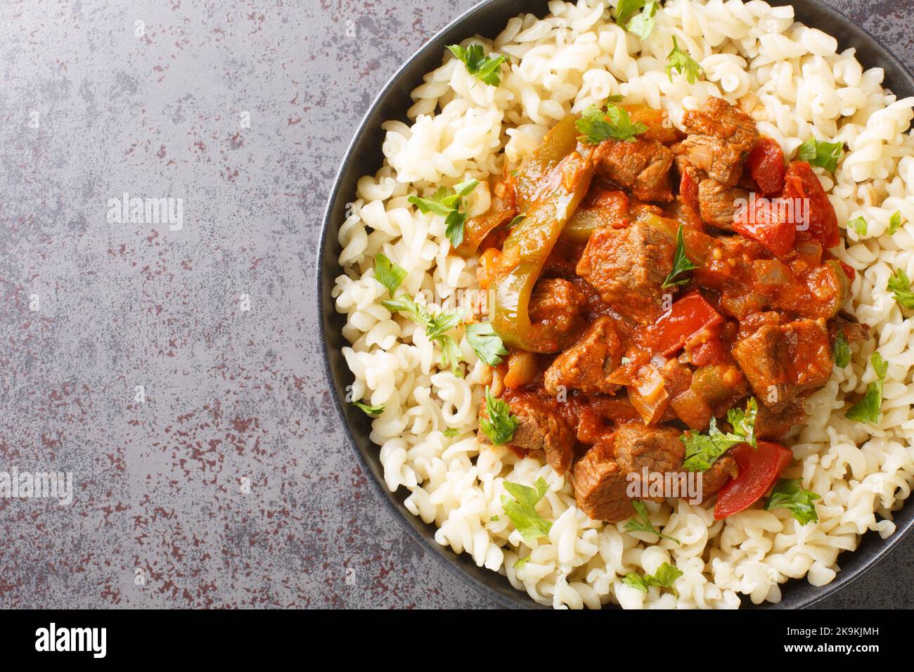 Porkolt is a Hungarian stew with boneless meat, paprika and some ...