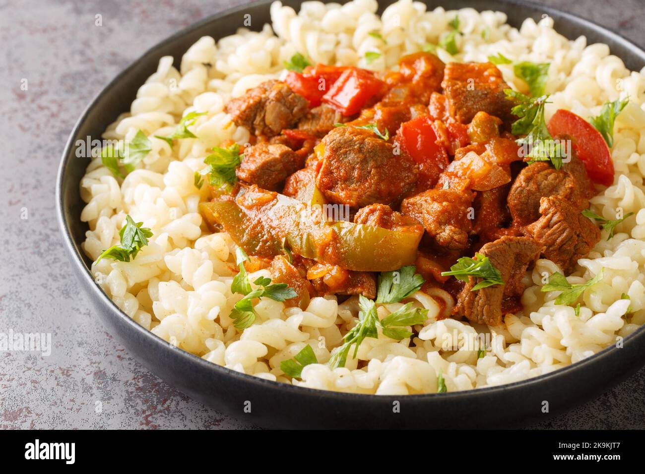 Porkolt is Hungarian for beef stew made by braising meat and simmering ...