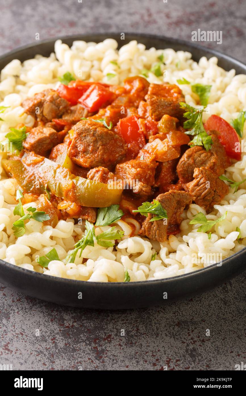 Porkolt is a classic Hungarian cuisine beef stew with onions and plenty ...