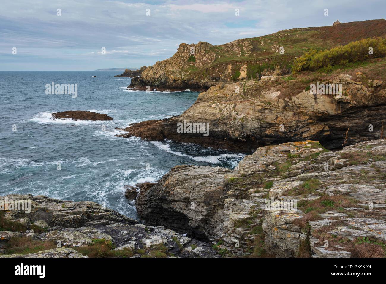 Moody landscape sunrise image at Prussia Cove in Cornwall England with ...