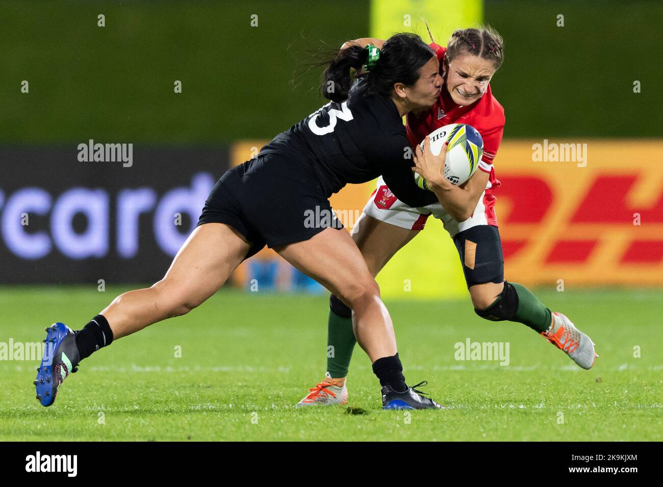 Wales' Jasmine Joyce (right) is tackled by New Zealand's Stacey Fluhler ...