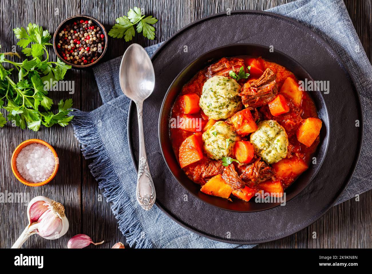Beef Stew with Dumplings and vegetables in rich tomato and stock based ...