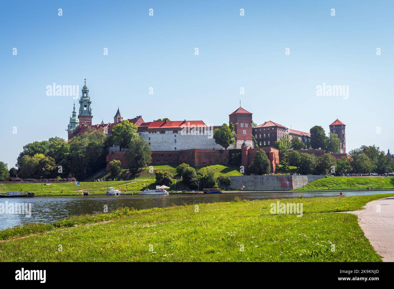 View of the beautiful royal castle at Wawel in Krakow. Boulevards over ...