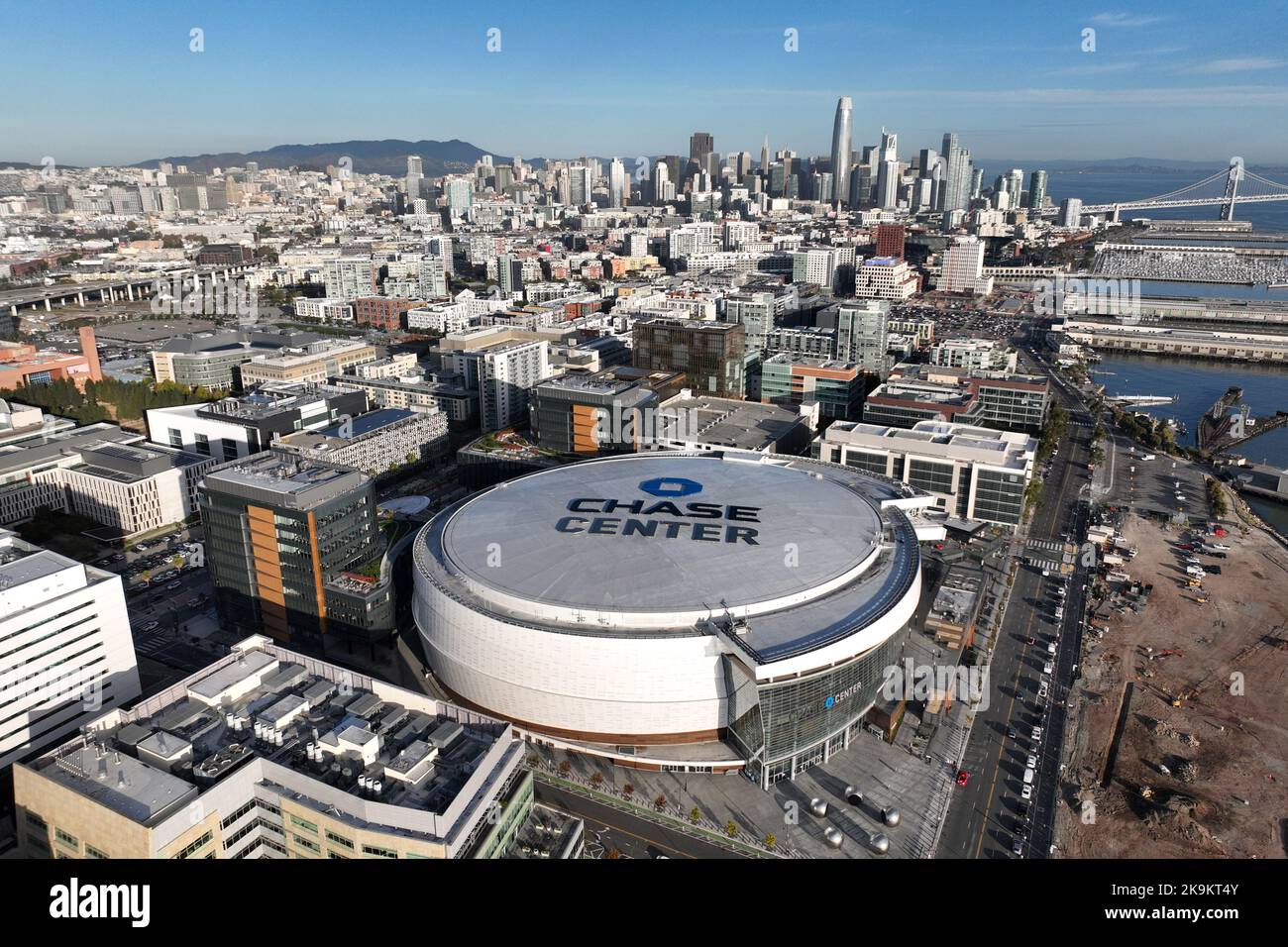 A general overall aerial view of the Chase Center with the Bay Bridge ...
