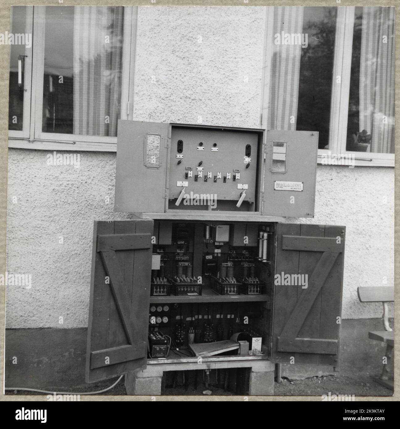 Forshult station with the relay cabinet opened Stock Photo - Alamy