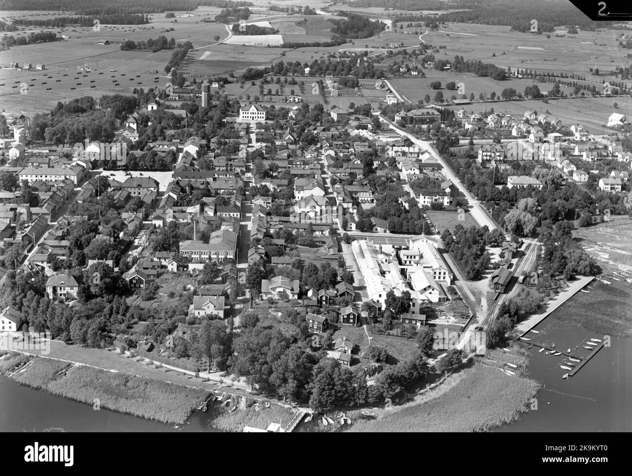 Aerial photo over the station and one-half-story station house in wood ...