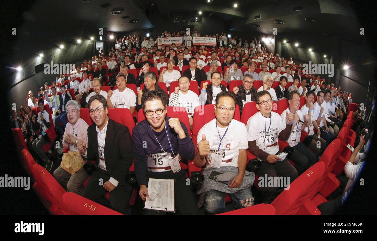A 178-strong group of people all called Hirokazu Tanaka meet at a hall ...