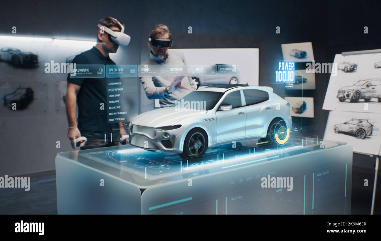 Two development engineers in the studio are designing an eco-friendly ...