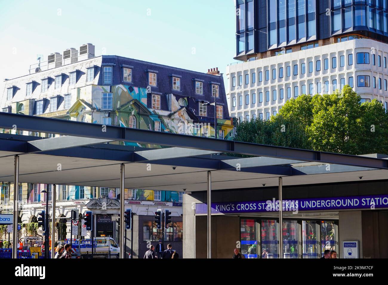People walking in front of a King’s Cross St Pancras Underground ...