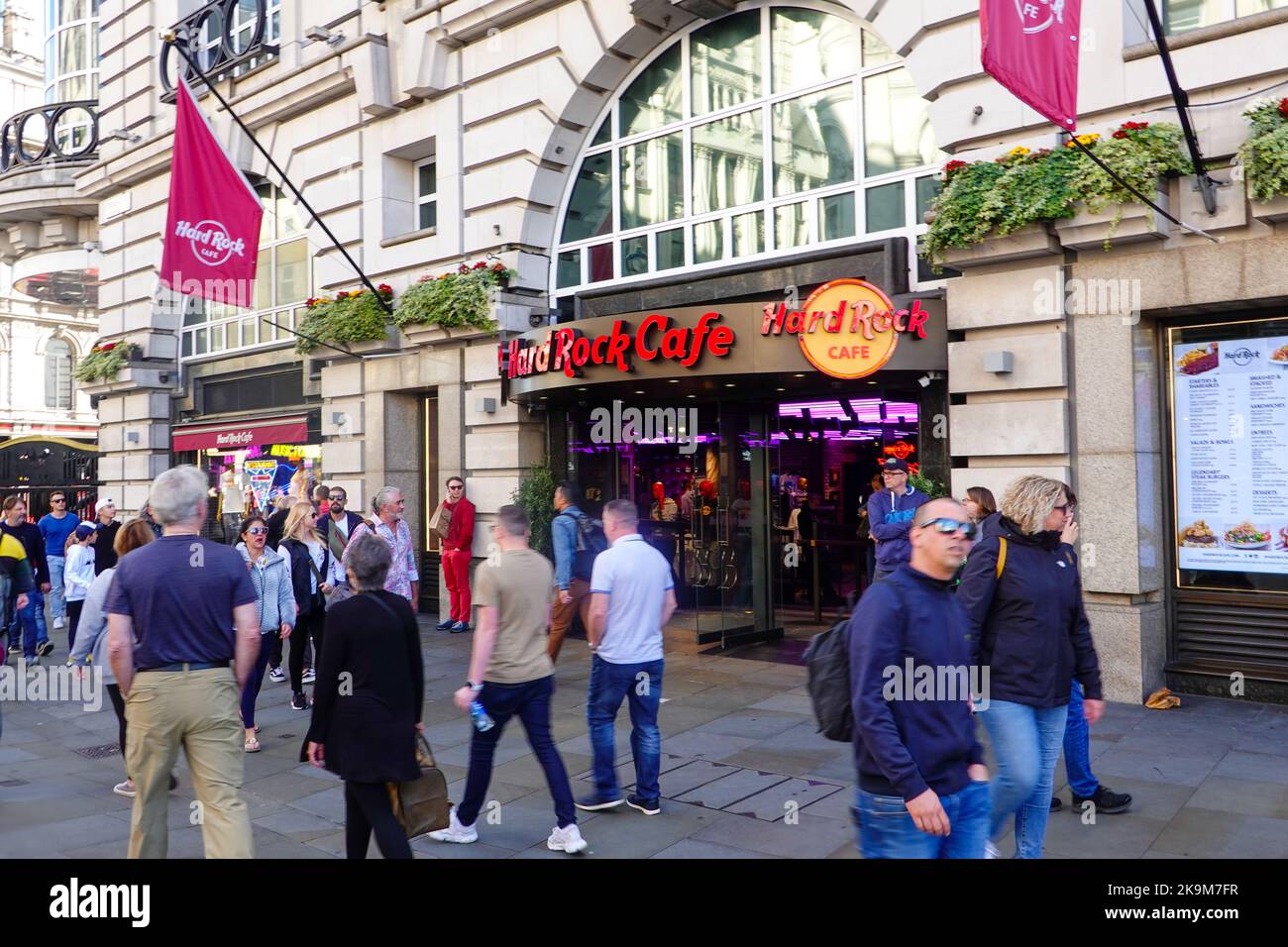 People walking in front of the London Piccadilly Circus Hard Rock Cafe ...
