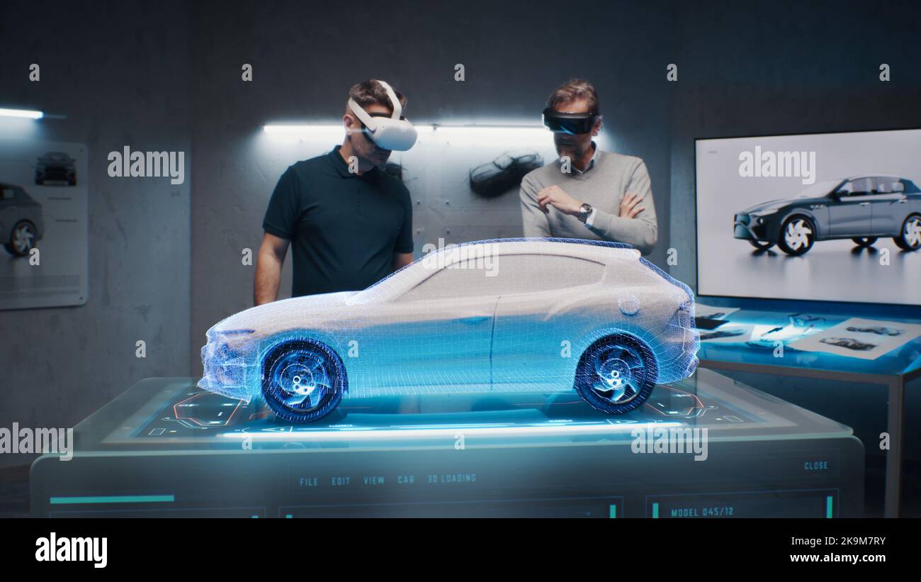 Two development engineers in the studio are designing an eco-friendly sustainable standard ...