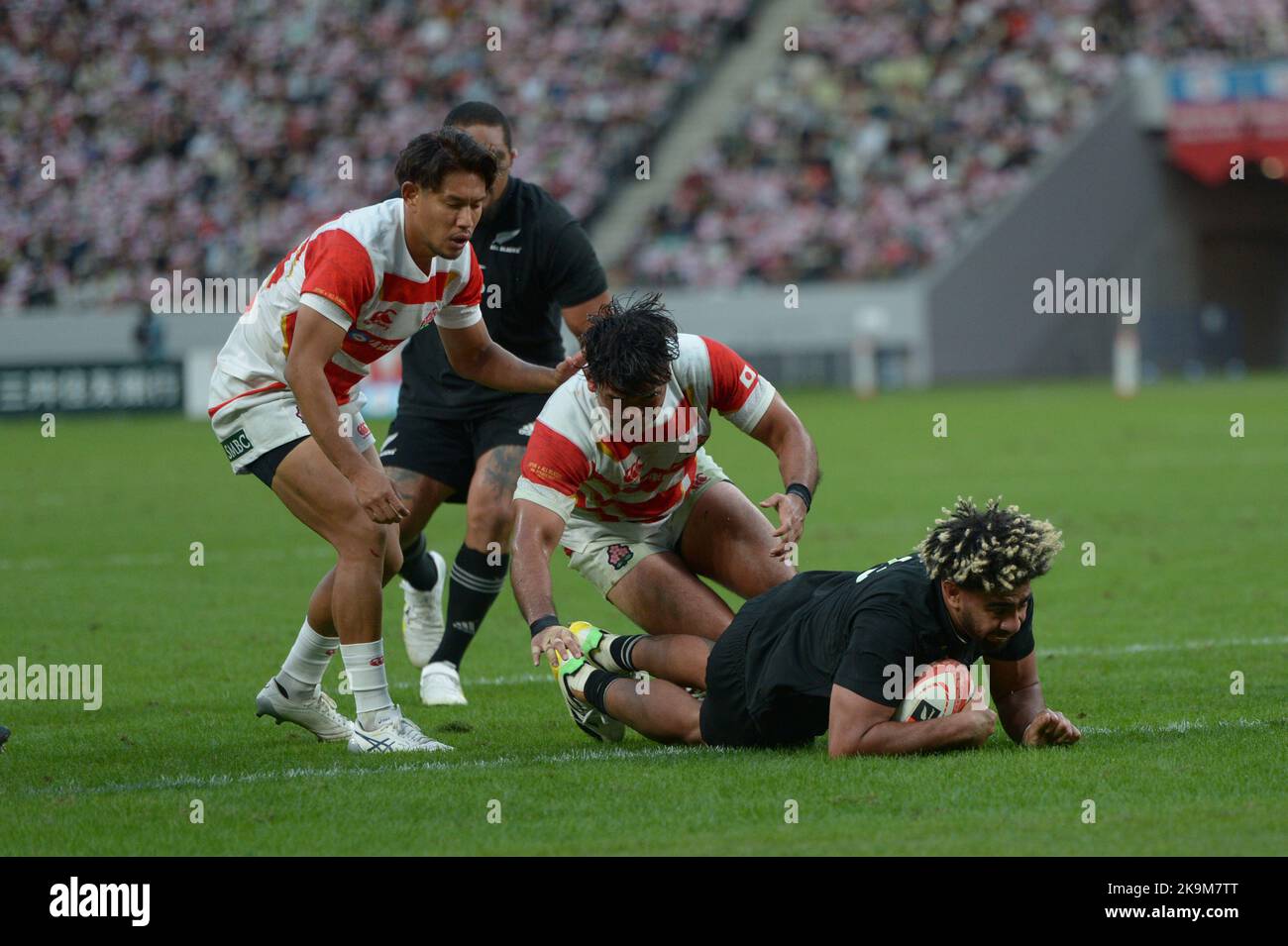 New Zealand's Hoskins Sotutu scores a try during the rugby test match ...