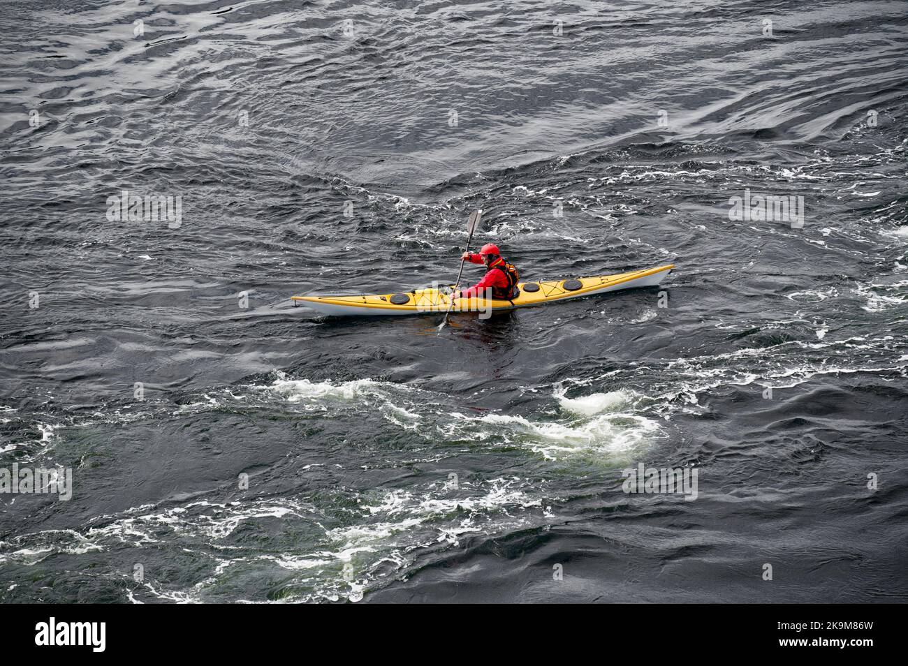 Canoe rowing across Loch Etive, a popular outdoor activity Stock Photo ...