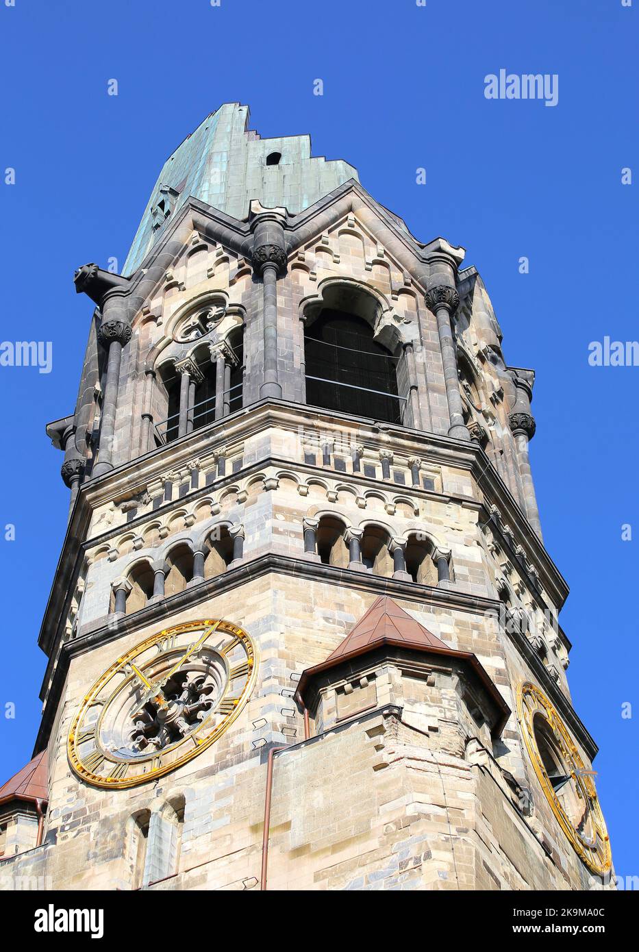 Ruins of Kaiser Wilhelm Memorial Church with Golden Clocks in Berlin ...
