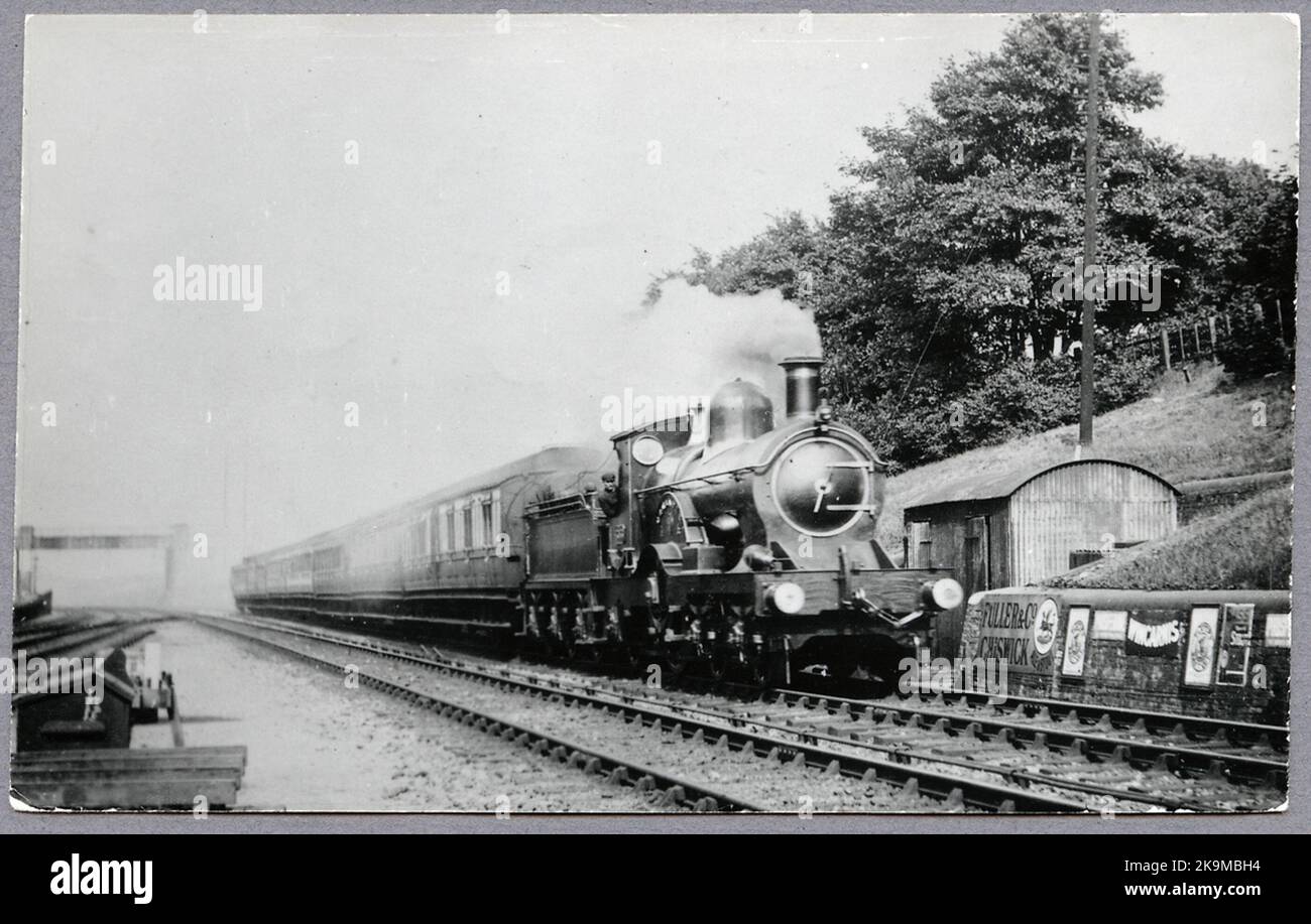 Steam locomotive with passenger car Stock Photo - Alamy