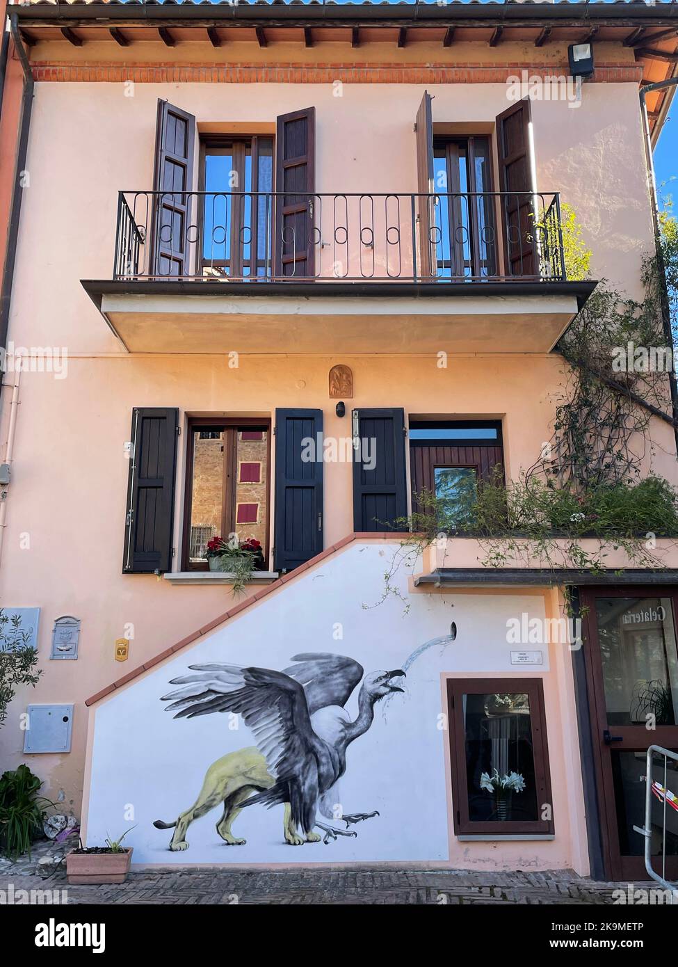 Dozza, Italy. Mural on the facade of a historical building, created by ...