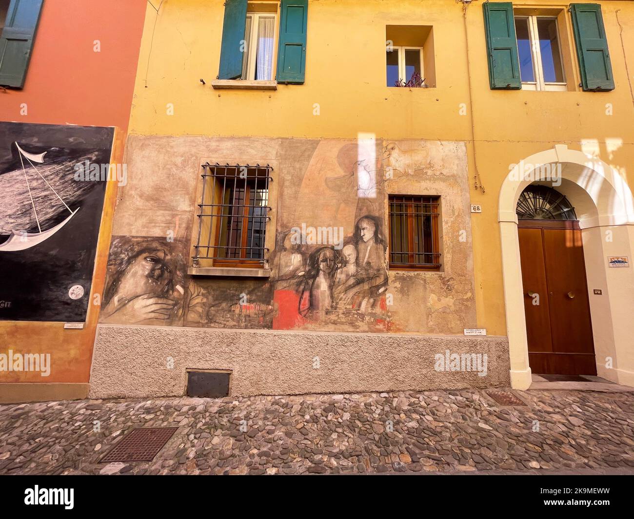 Dozza, Italy. Murals on the facade of historical buildings, created by ...