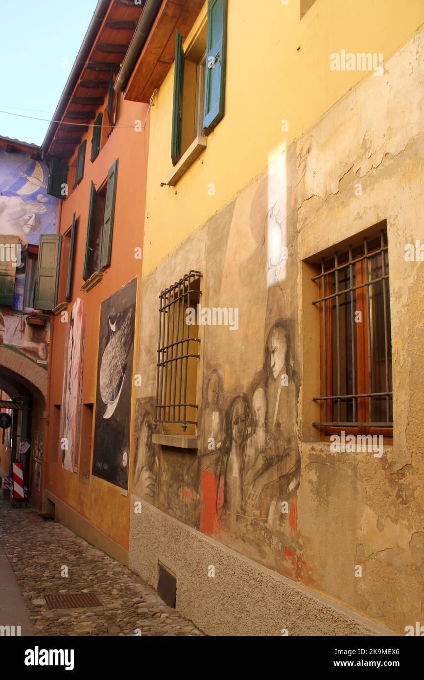 Dozza, Italy. Murals on the facade of historical buildings, created by ...