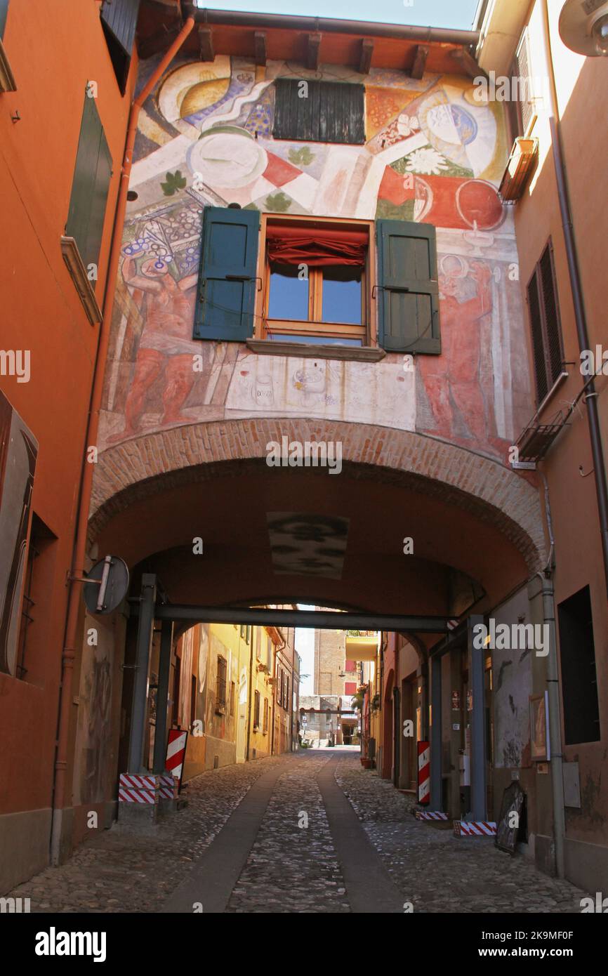 Dozza, Italy. Murals on the facade of historical buildings, created by ...