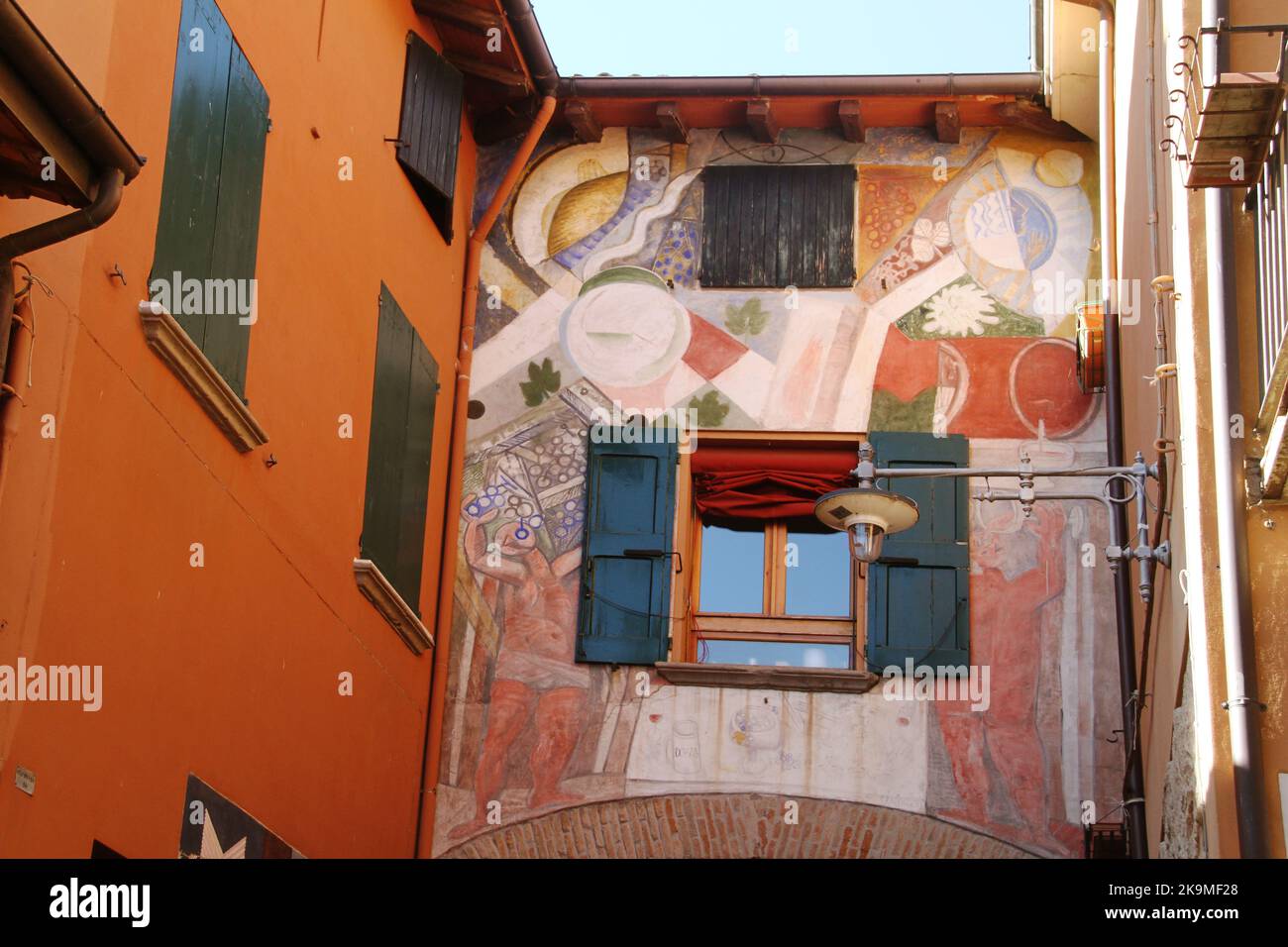 Dozza, Italy. Murals on the facade of historical buildings, created by ...